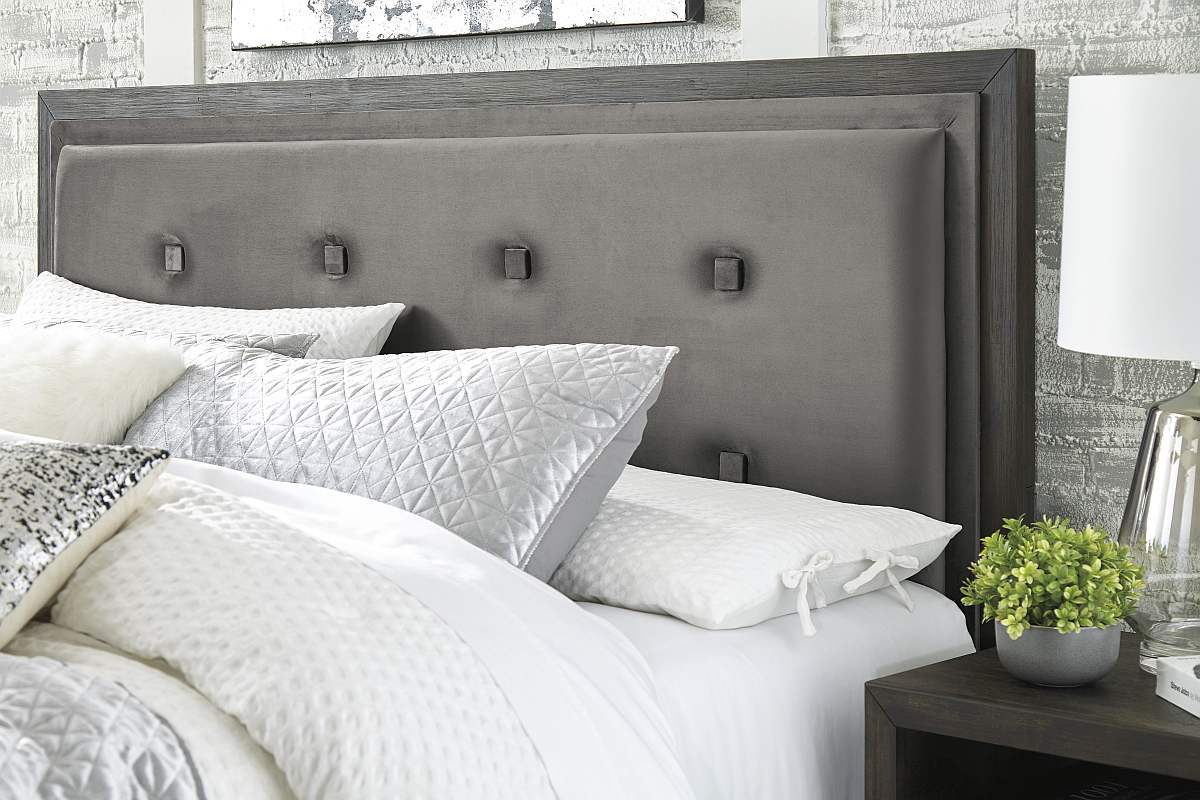 Signature Design by Ashley Hyndell Dark Brown Queen Upholstered Storage Bed Farnham s Furniture Galleries Casper Wyoming